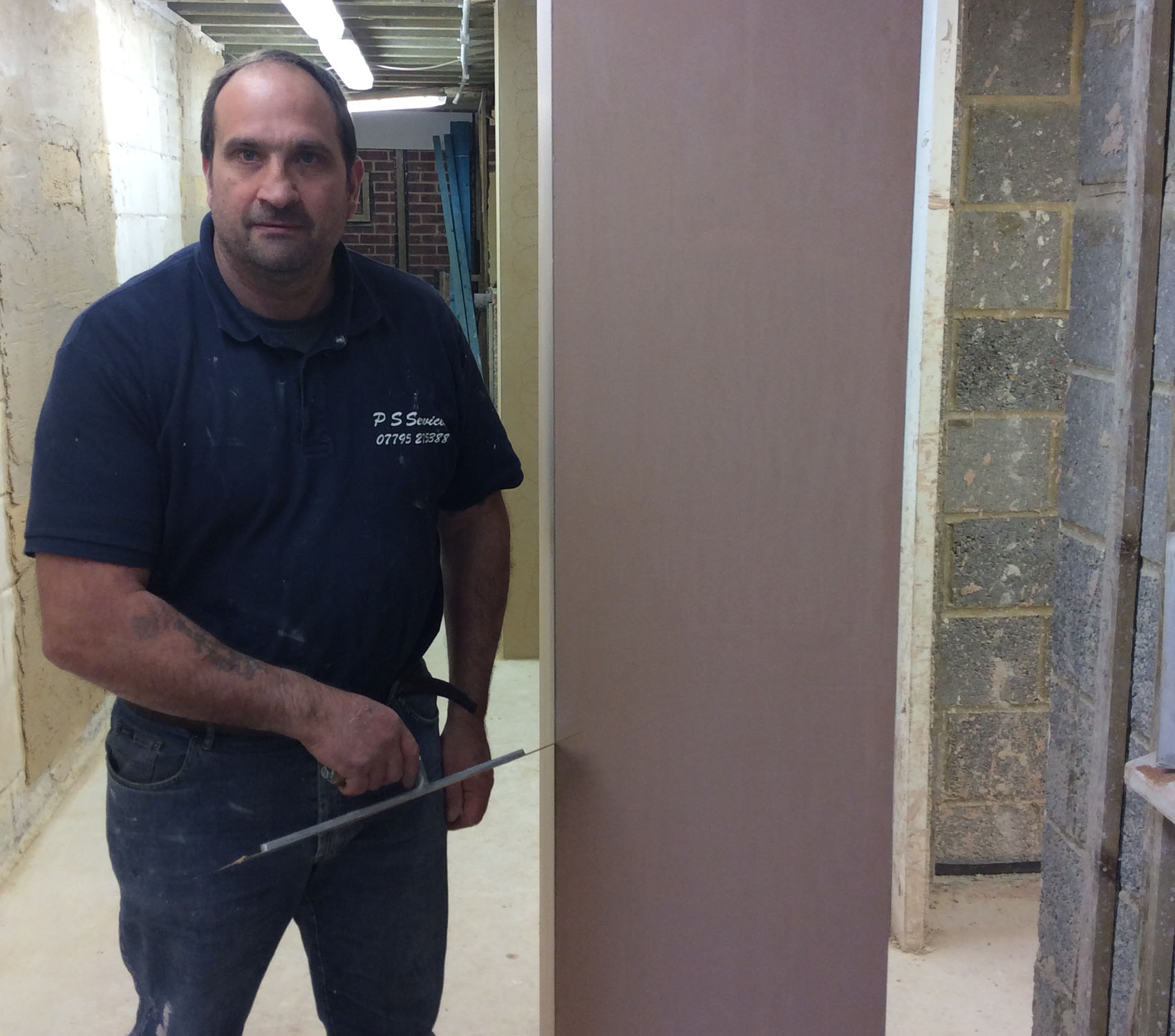 Father and Son on the plastering courses!